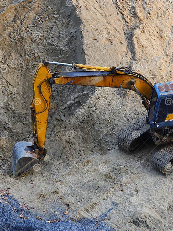 Excavator Loader with Rised Backhoe Standing in Sand Stock Image ...