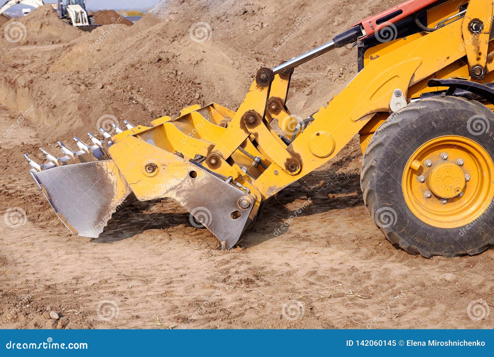 Excavator Loader Working at Ground Area, Digging Process. Yellow Bucket ...