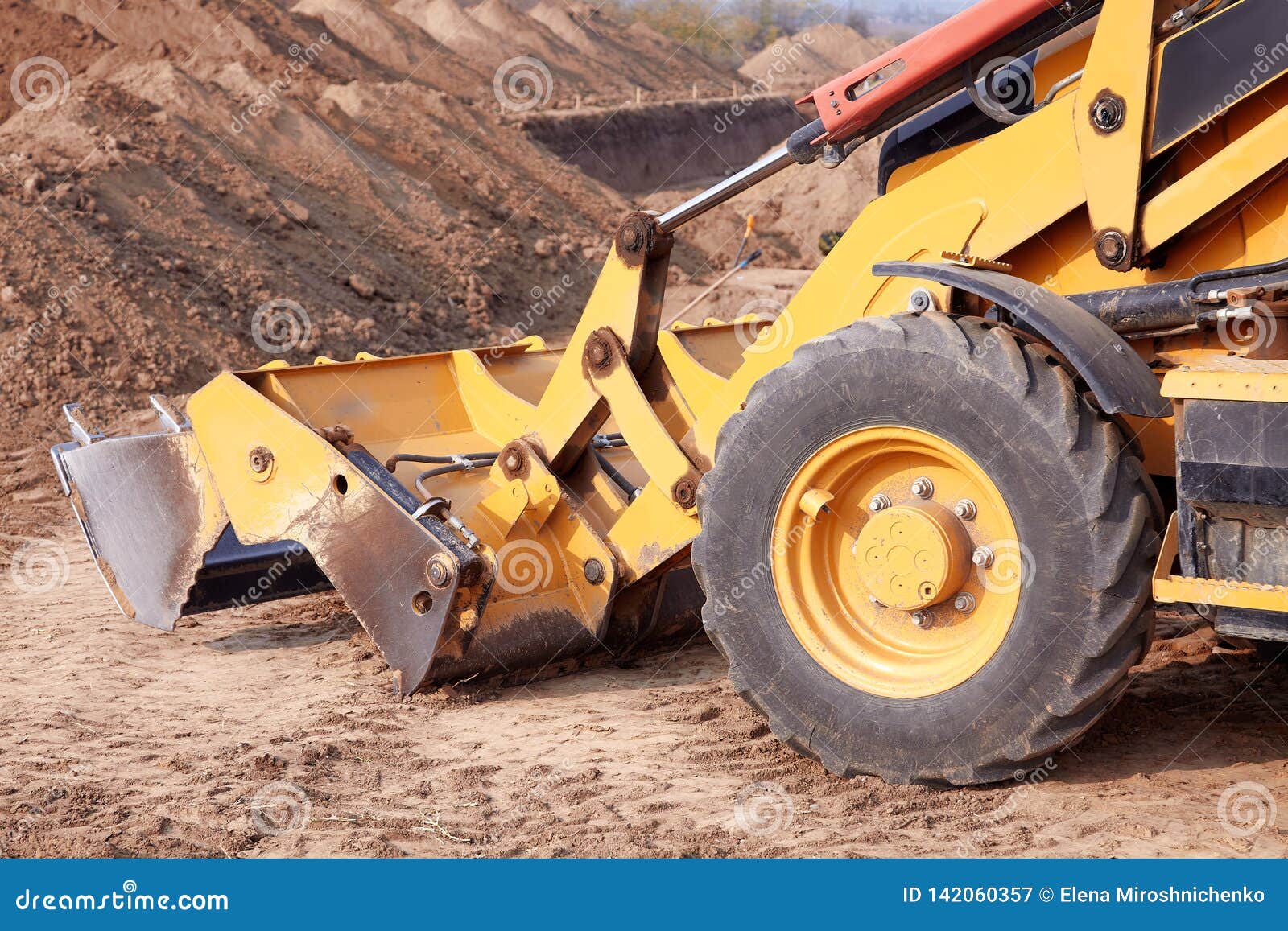 Excavator Loader Working at Ground Area, Digging Process. Yellow Bucket ...