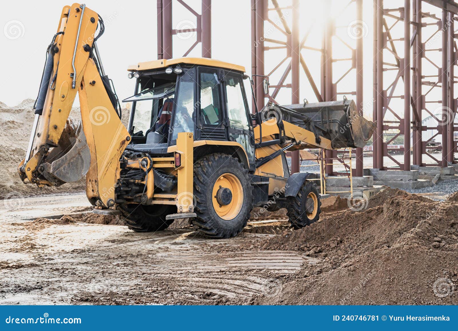 The Excavator Loader Works with a Bucket for Transporting Sand at a ...