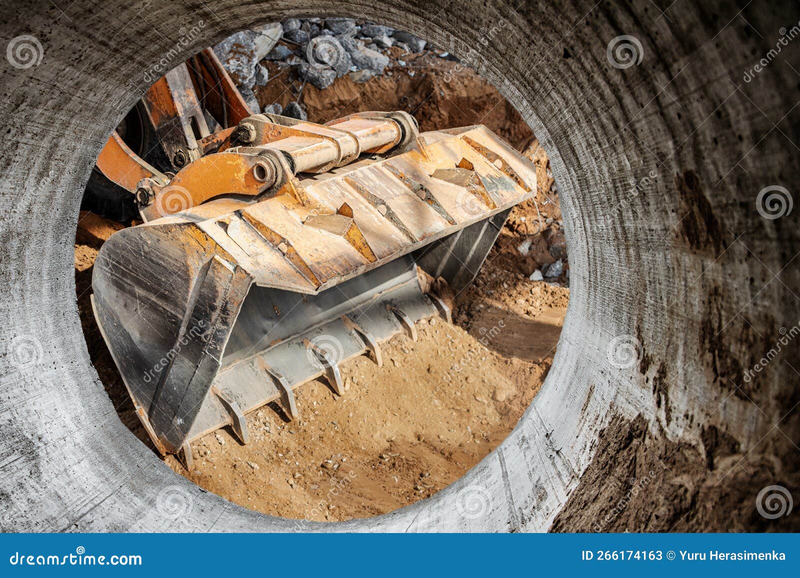 The Excavator Loader Works with a Bucket for Transporting Sand at a ...