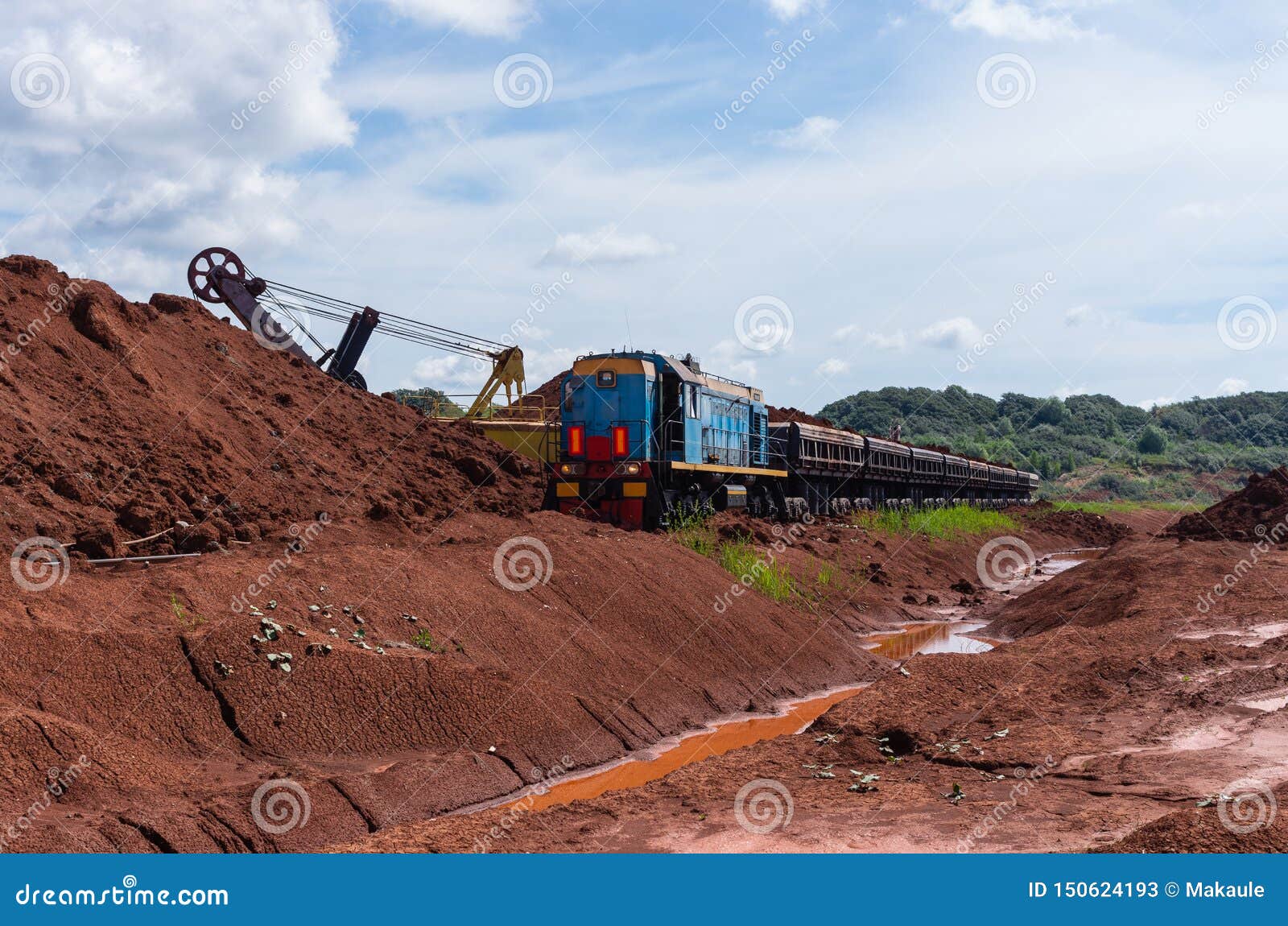 Excavator Loading Clay To the Train Stock Image - Image of quarry, view ...