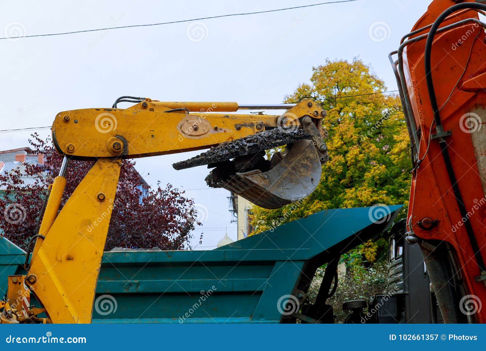 Excavator Loading Dump-truck Stock Image - Image of move, action: 102661357