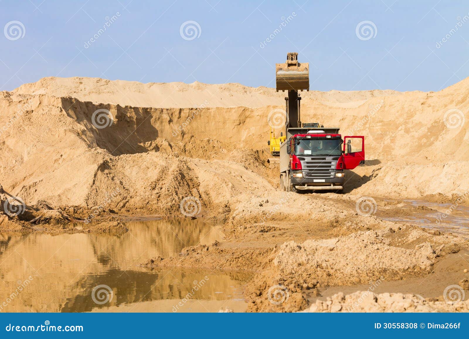 Excavator Loading Dumper Truck Stock Photo - Image of backhoe, land ...