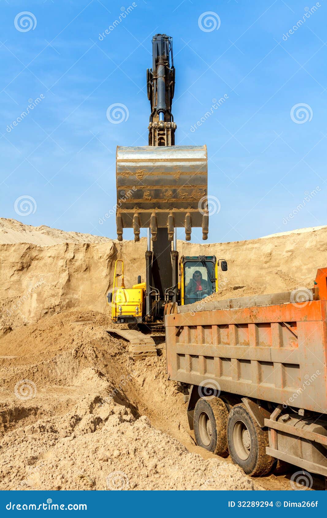 Excavator Loading Dumper Truck Stock Photo - Image of excavator ...