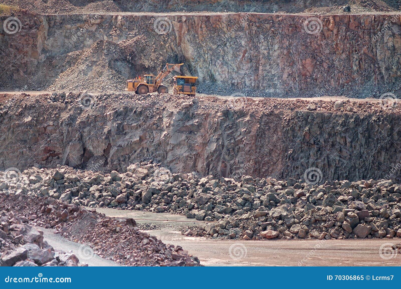 Excavator Loading Dumper Truck in a Quarry Mine. Stock Image - Image of ...