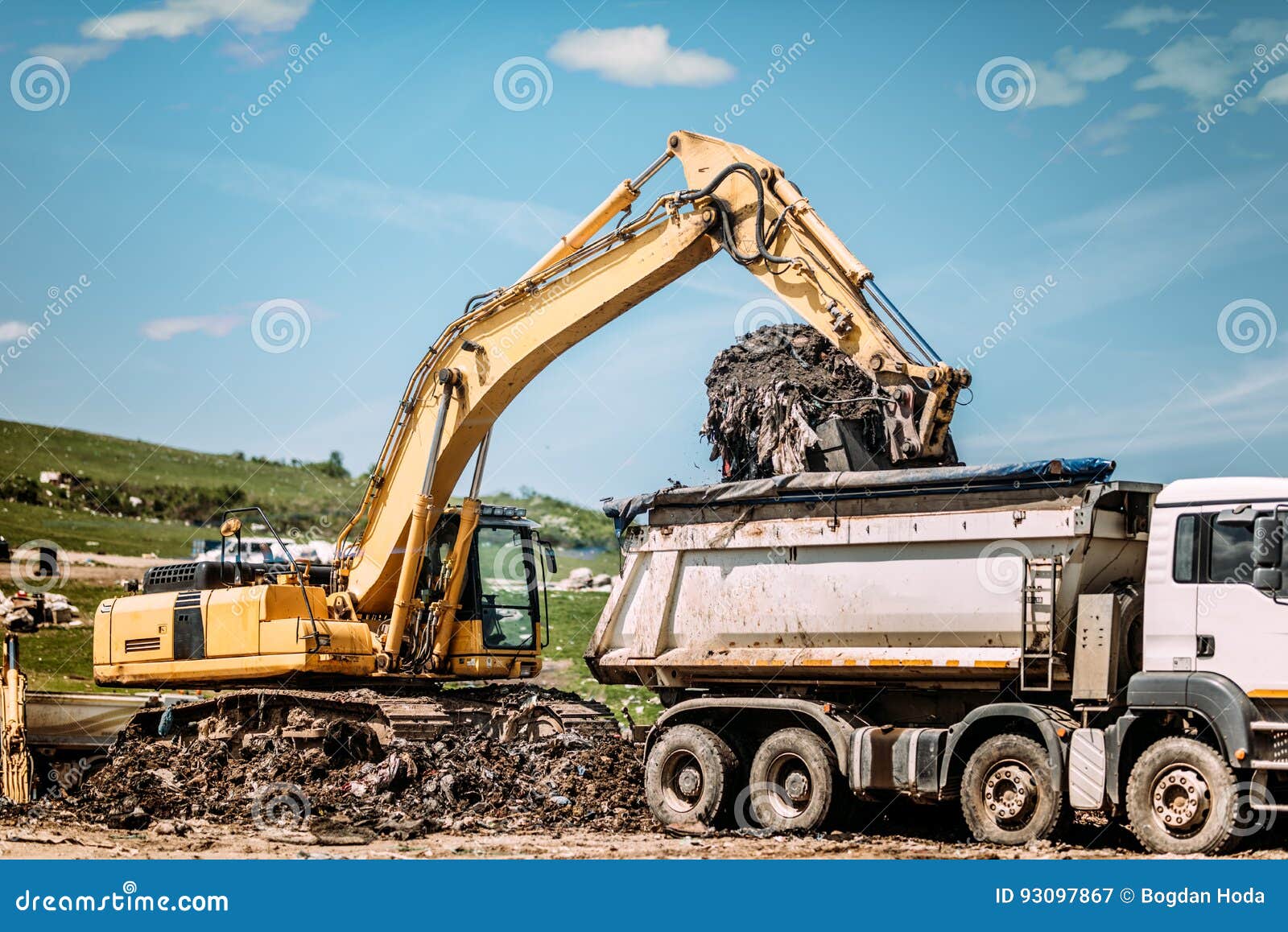 Excavator Loading Dumper Trucks at Garbage Dumping Site Stock Image ...