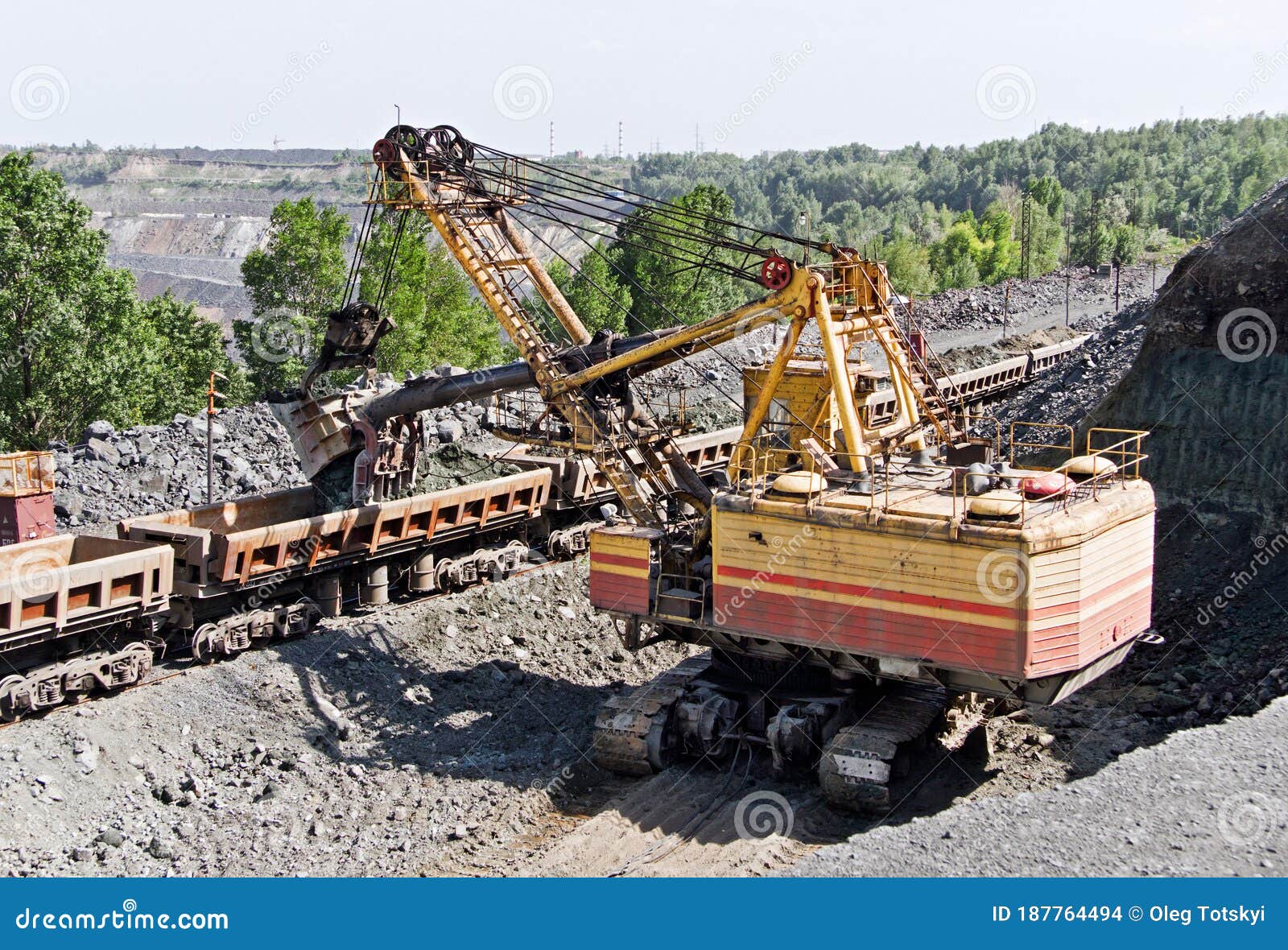 Excavator Loading Iron Ore into Goods Wagon. Iron Ore Opencast Mine ...