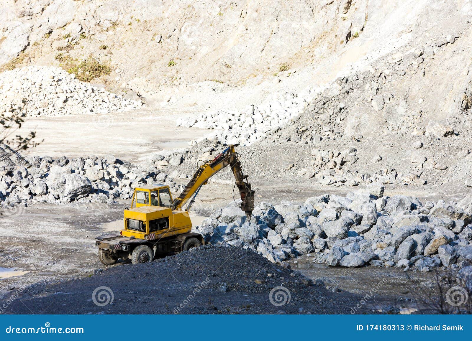Excavator Loading Rocks at Quarry Stock Image - Image of backhoe ...