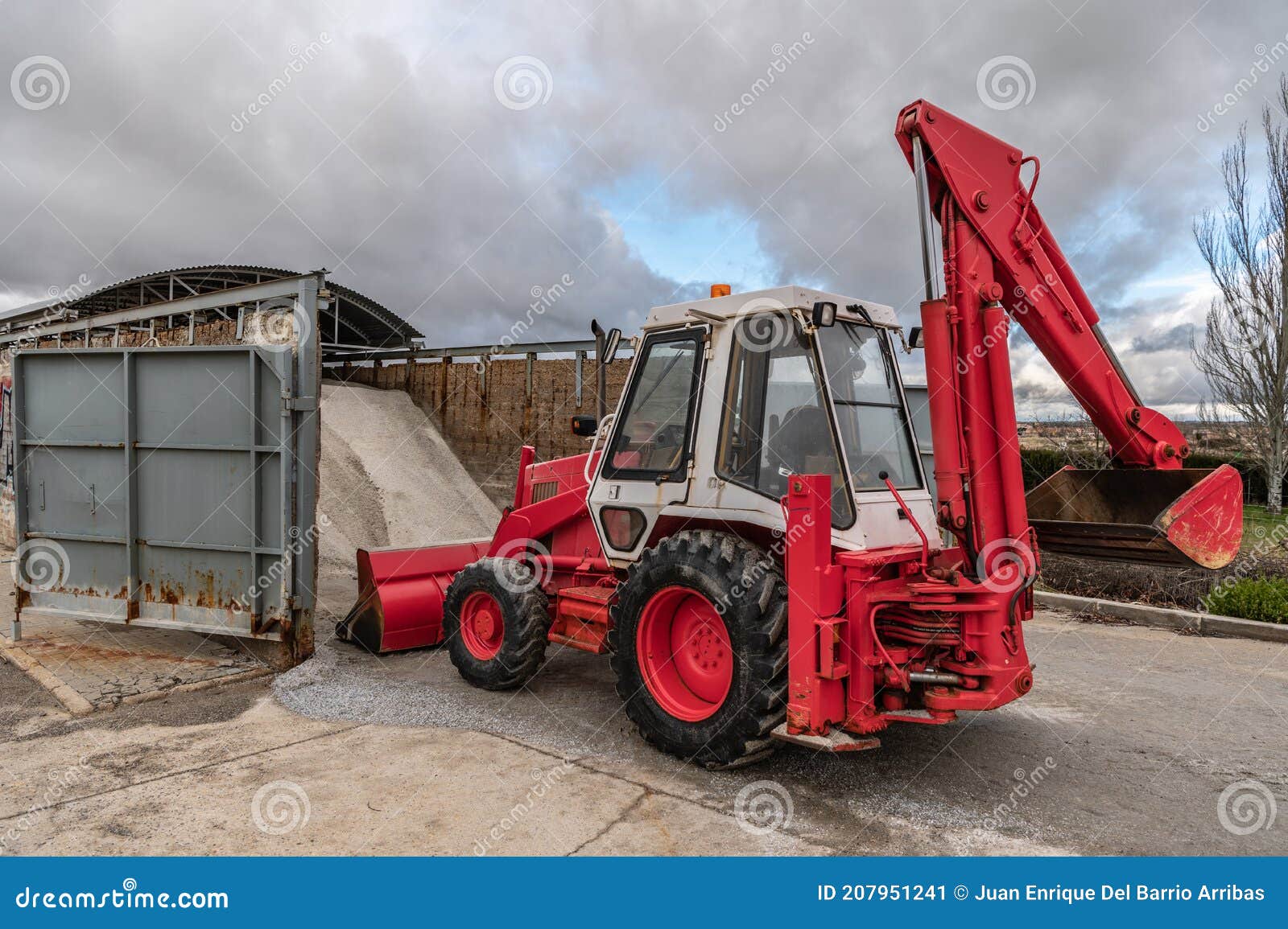 Excavator Loading Salt for Road Treatment in Winter Stock Image - Image ...