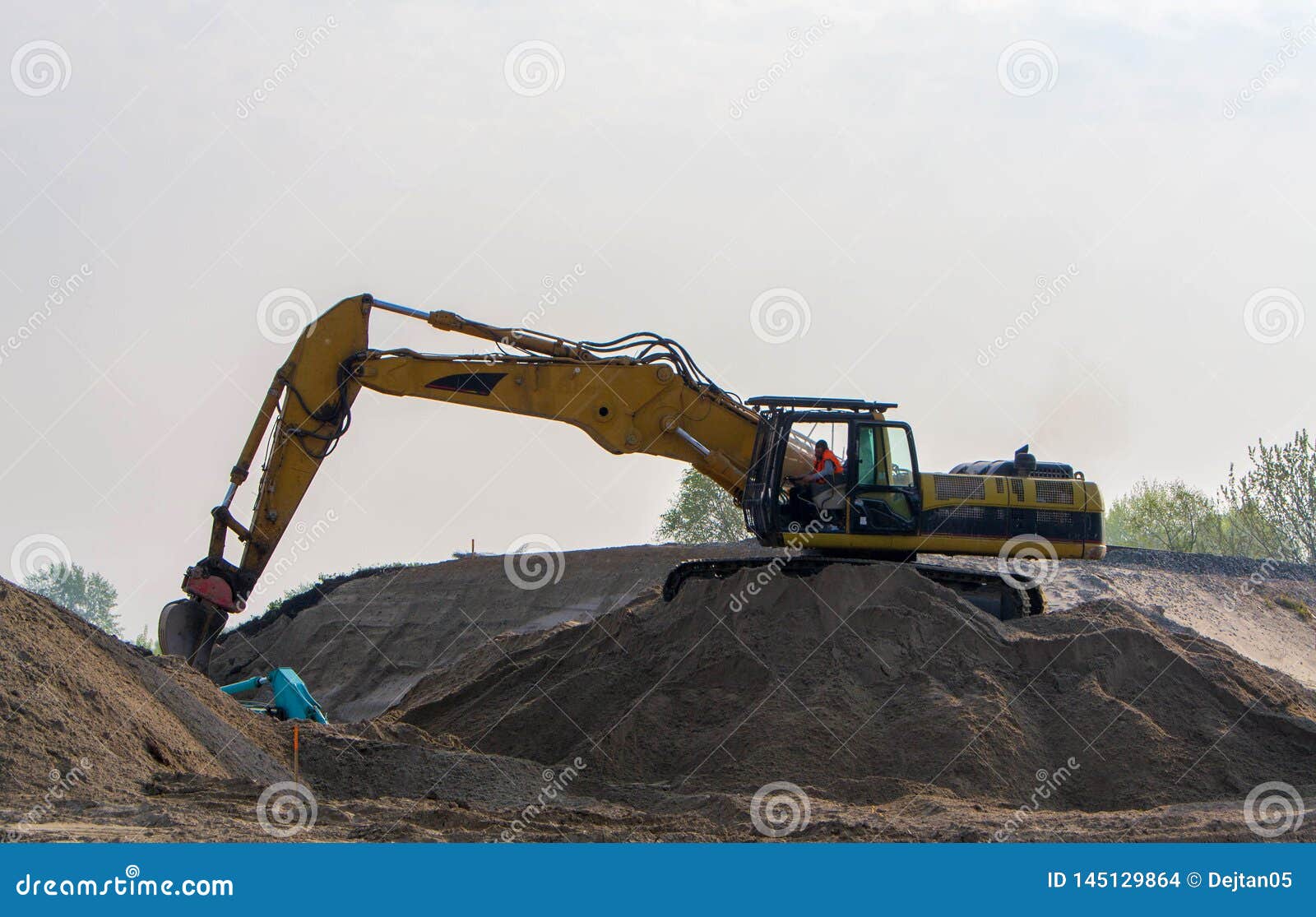Excavator Loading Sand in the Truck Stock Photo - Image of digger ...