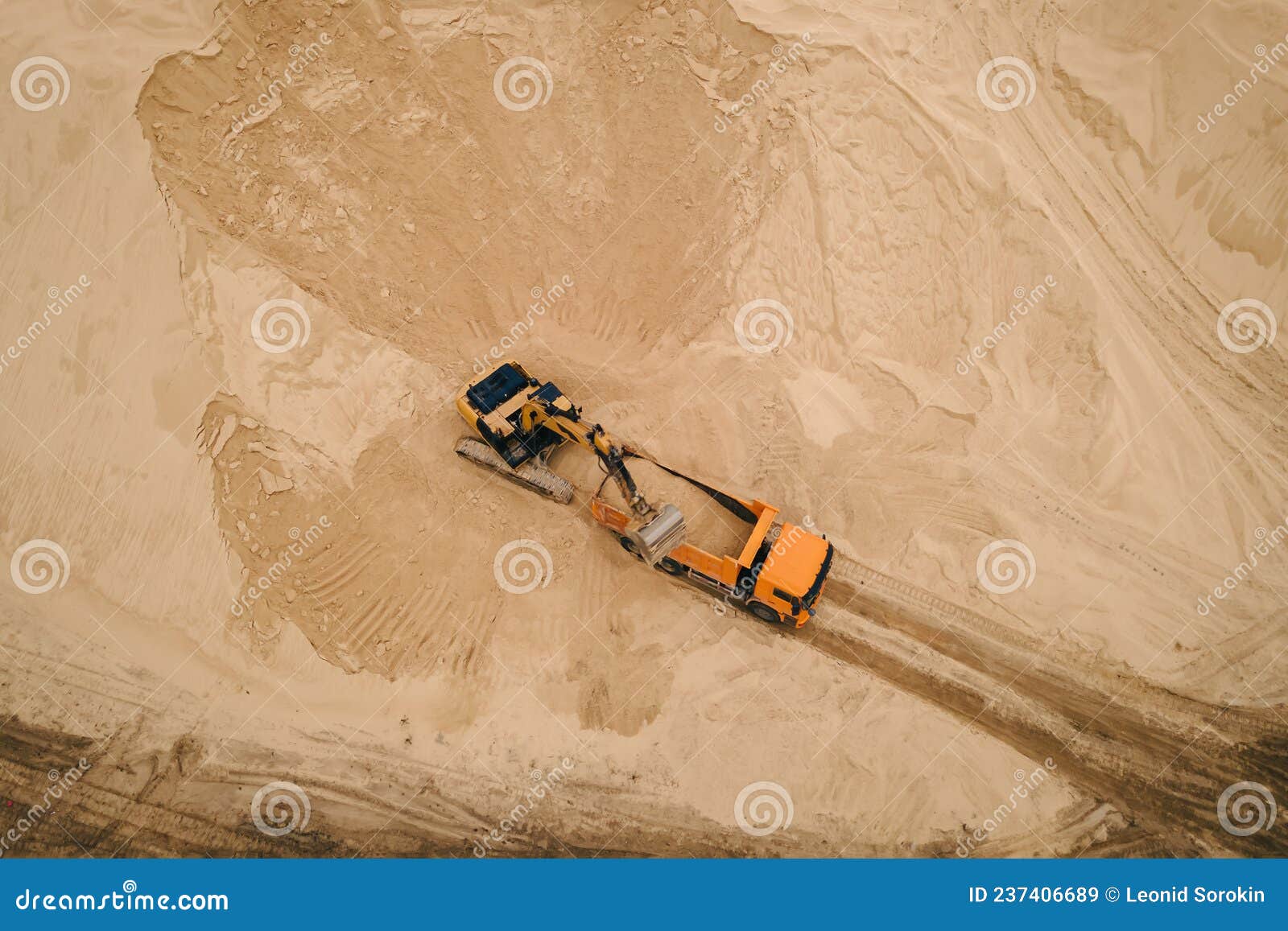 Excavator Loading Sand into Truck in Opencast Sand Quarry Stock Image ...