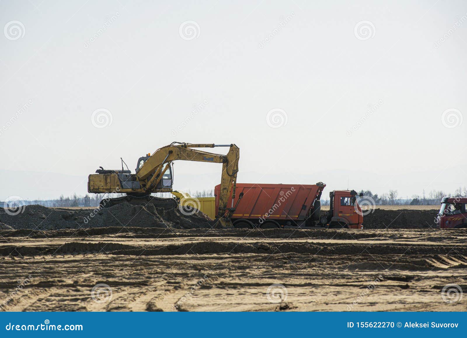Excavator Loading Soil, Sand in a Dump Truck Editorial Image - Image of ...