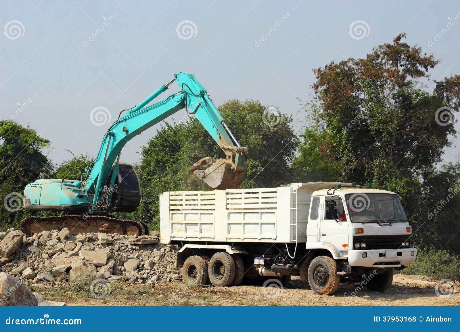 Excavator In A Stone Extraction Mine To Transform Into A Gravel Royalty ...