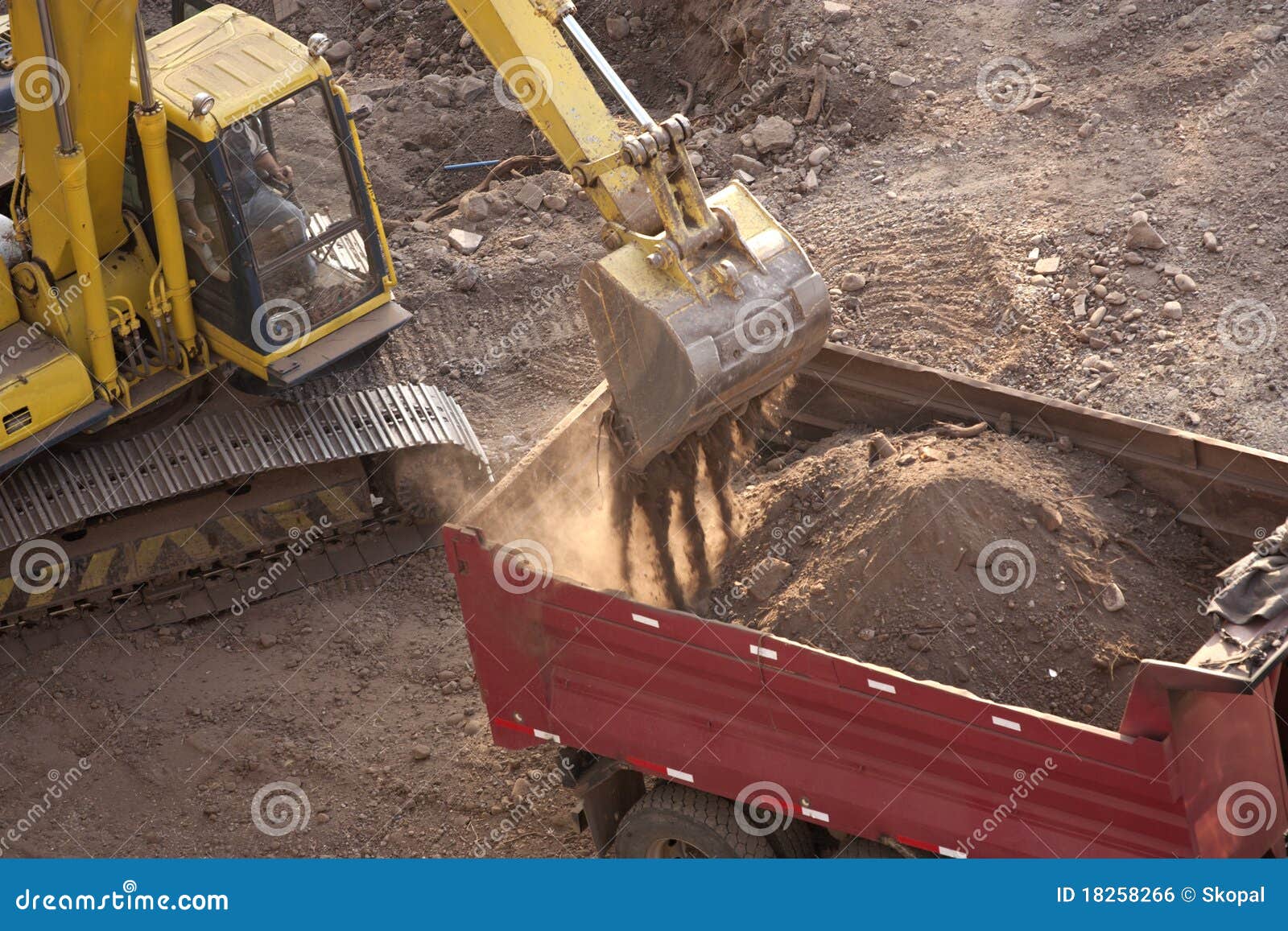 Excavator loading a truck stock photo. Image of dipper - 18258266