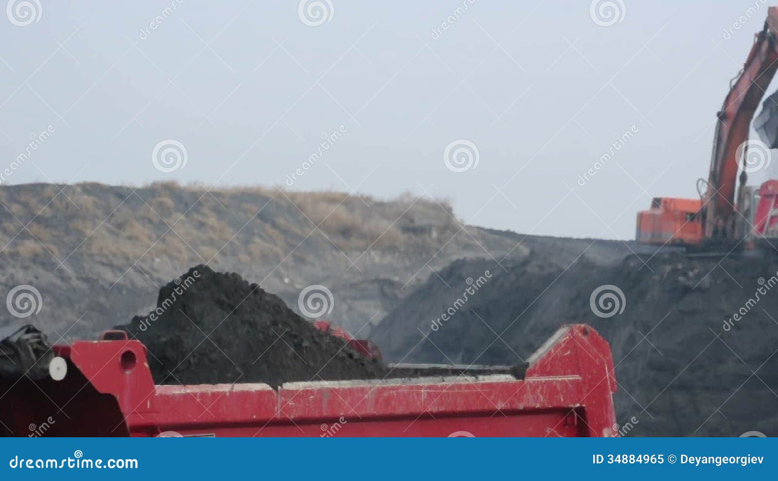 Excavator loading truck stock video footage. Video of equipment - 34884965