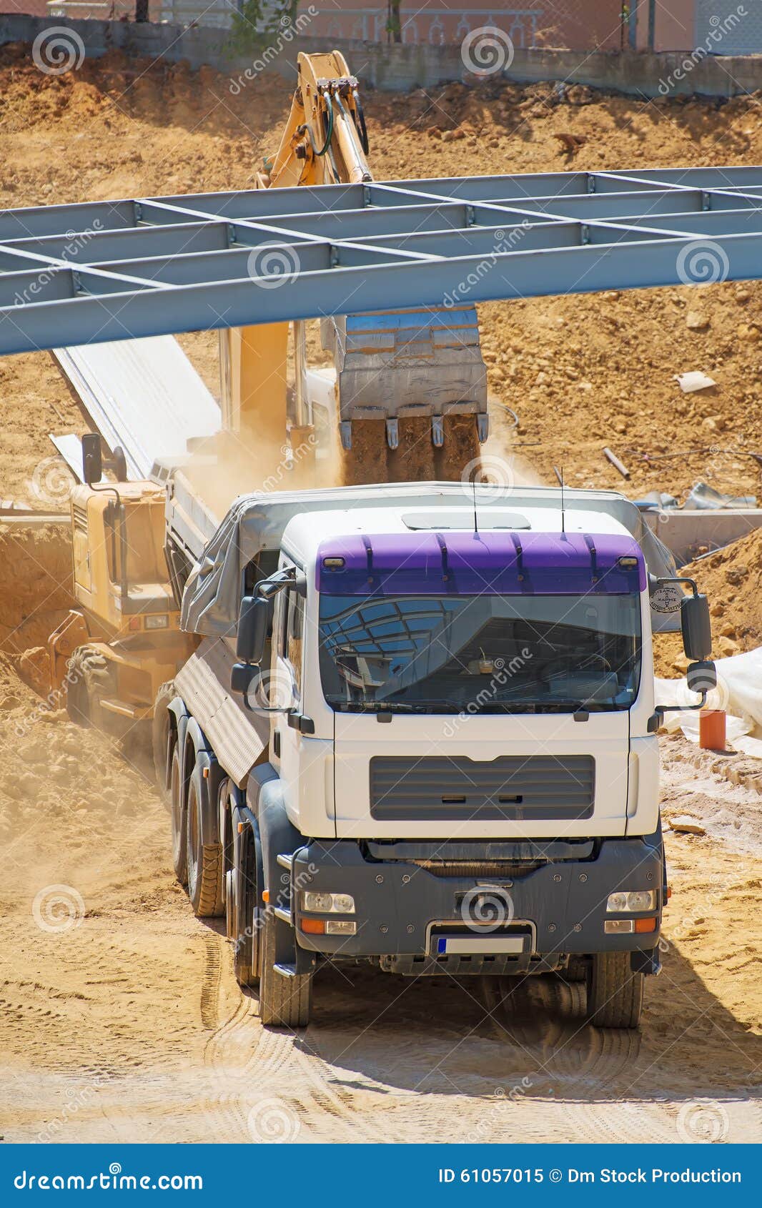 Excavator loading truck. stock image. Image of digger - 61057015