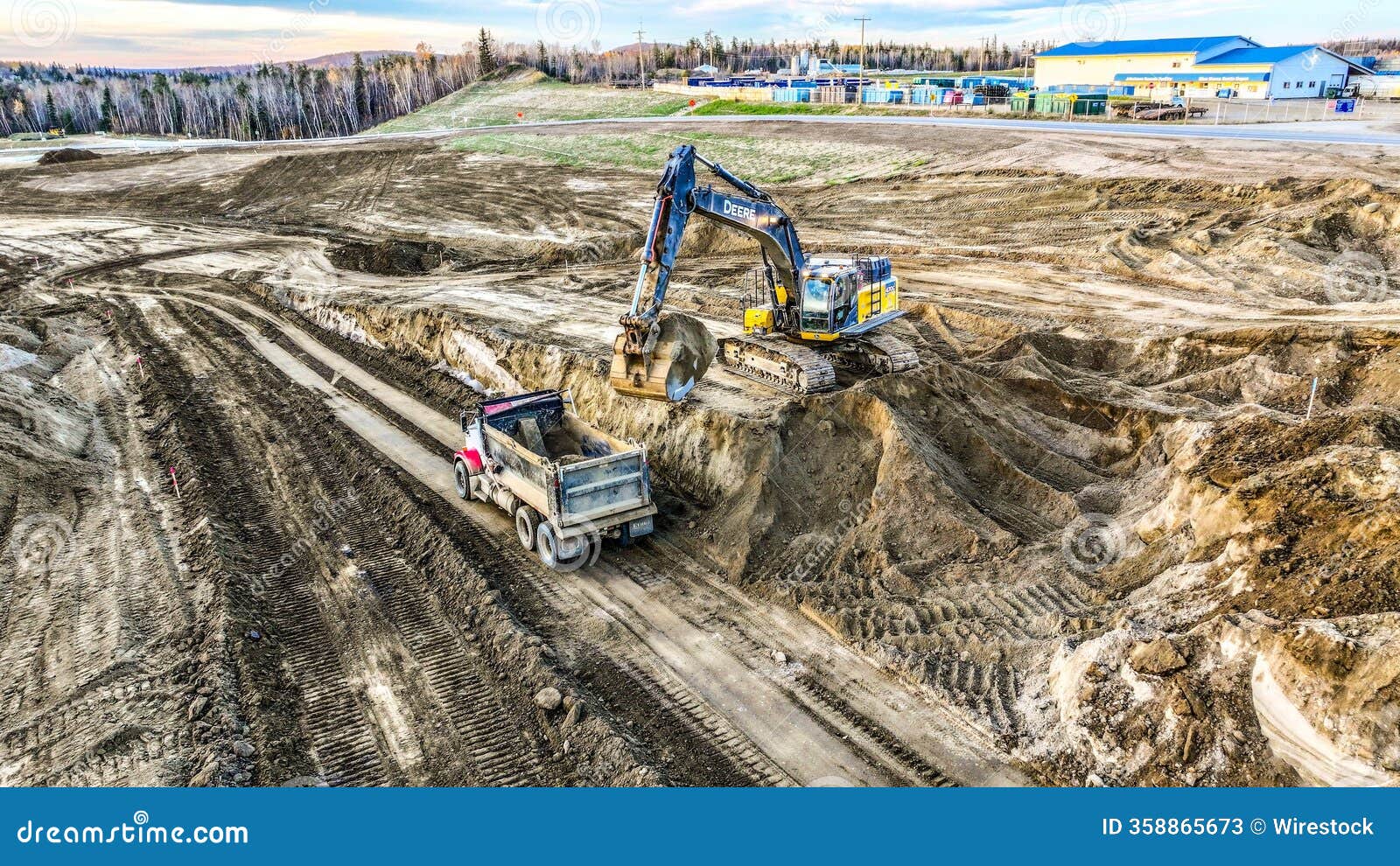 Excavator Loading Truck at Construction Site. Stock Image - Image of ...