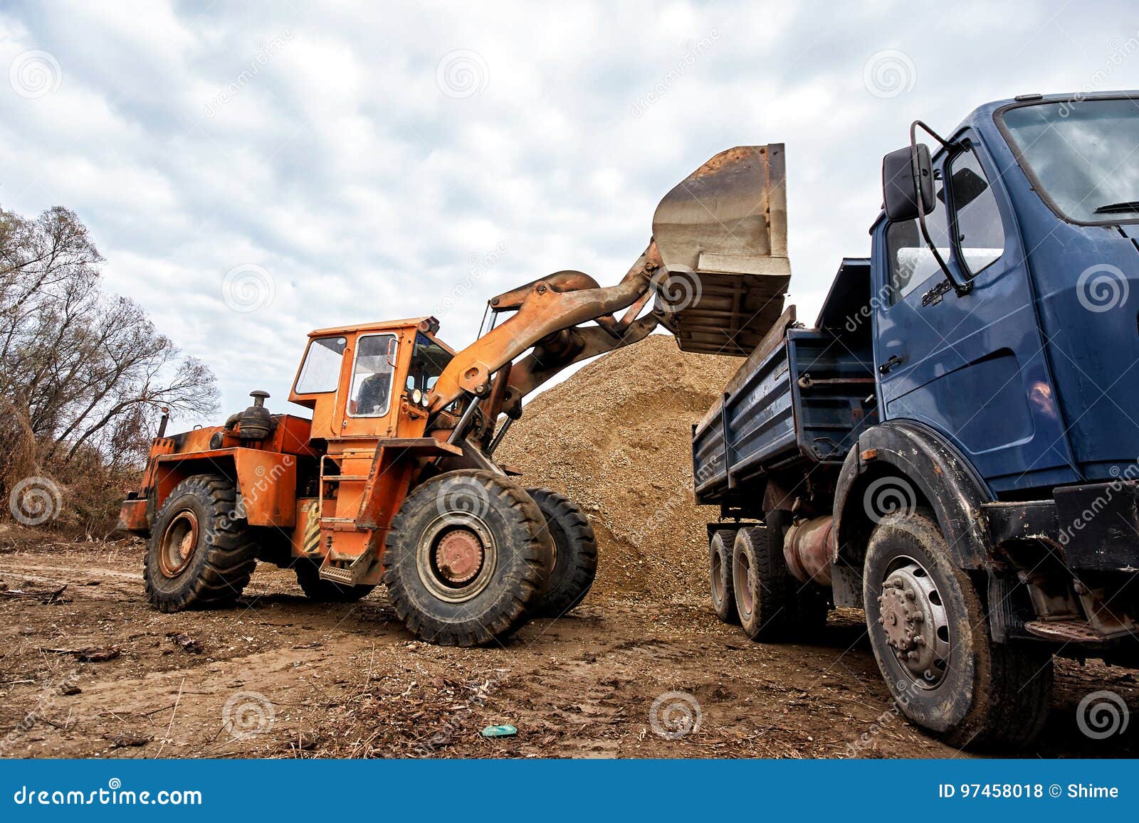 Excavator loading stock photo. Image of excavator, gold - 97458018