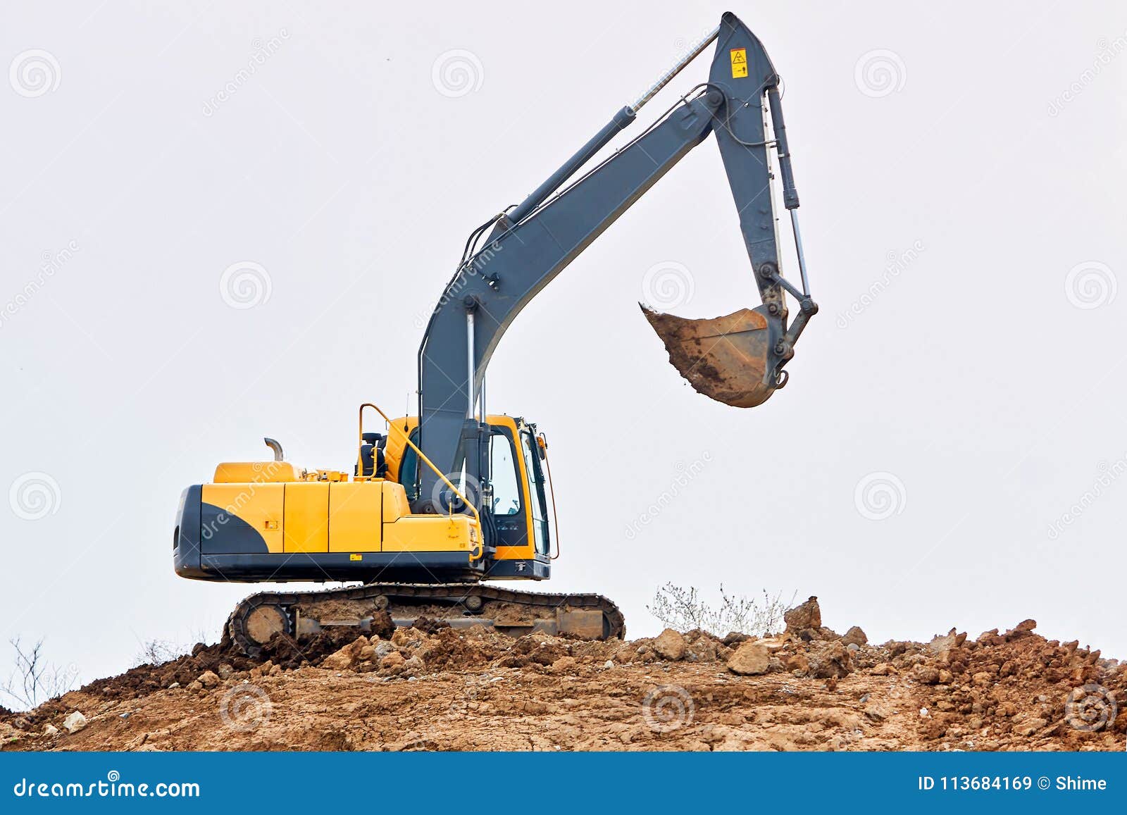 Excavator loading stock image. Image of yellow, digger - 113684169