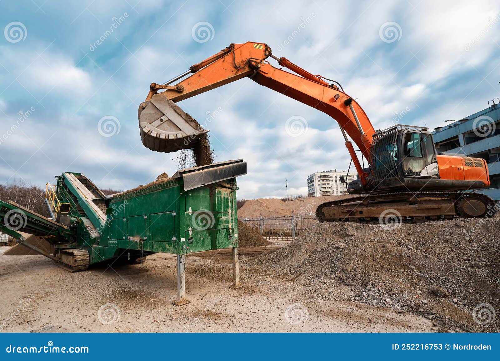 Excavator Loads Soil in Mobile Crushing and Sorting Complex Stock Image ...