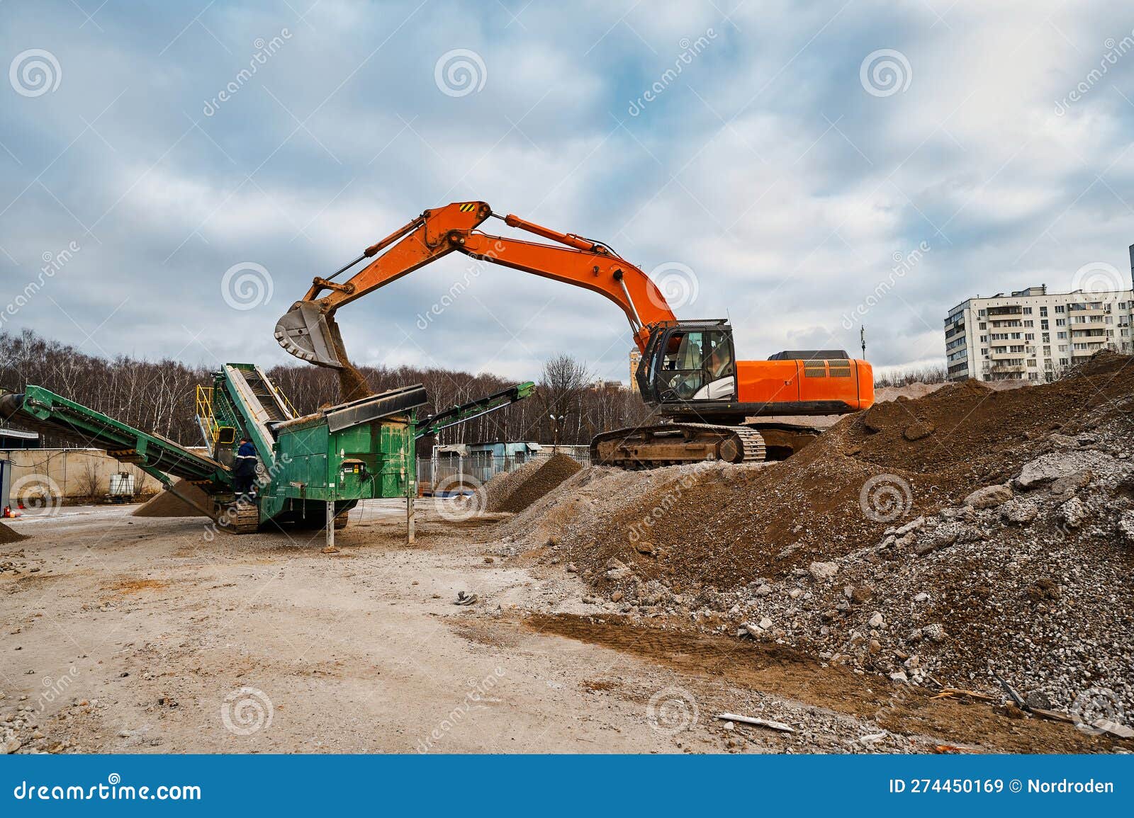 Excavator Loads Soil in Mobile Crushing and Sorting Complex Stock Image ...