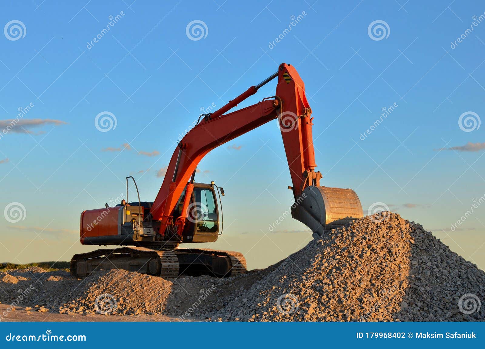 Excavator Loads of Stone and Rubble for Processing into Cement or ...
