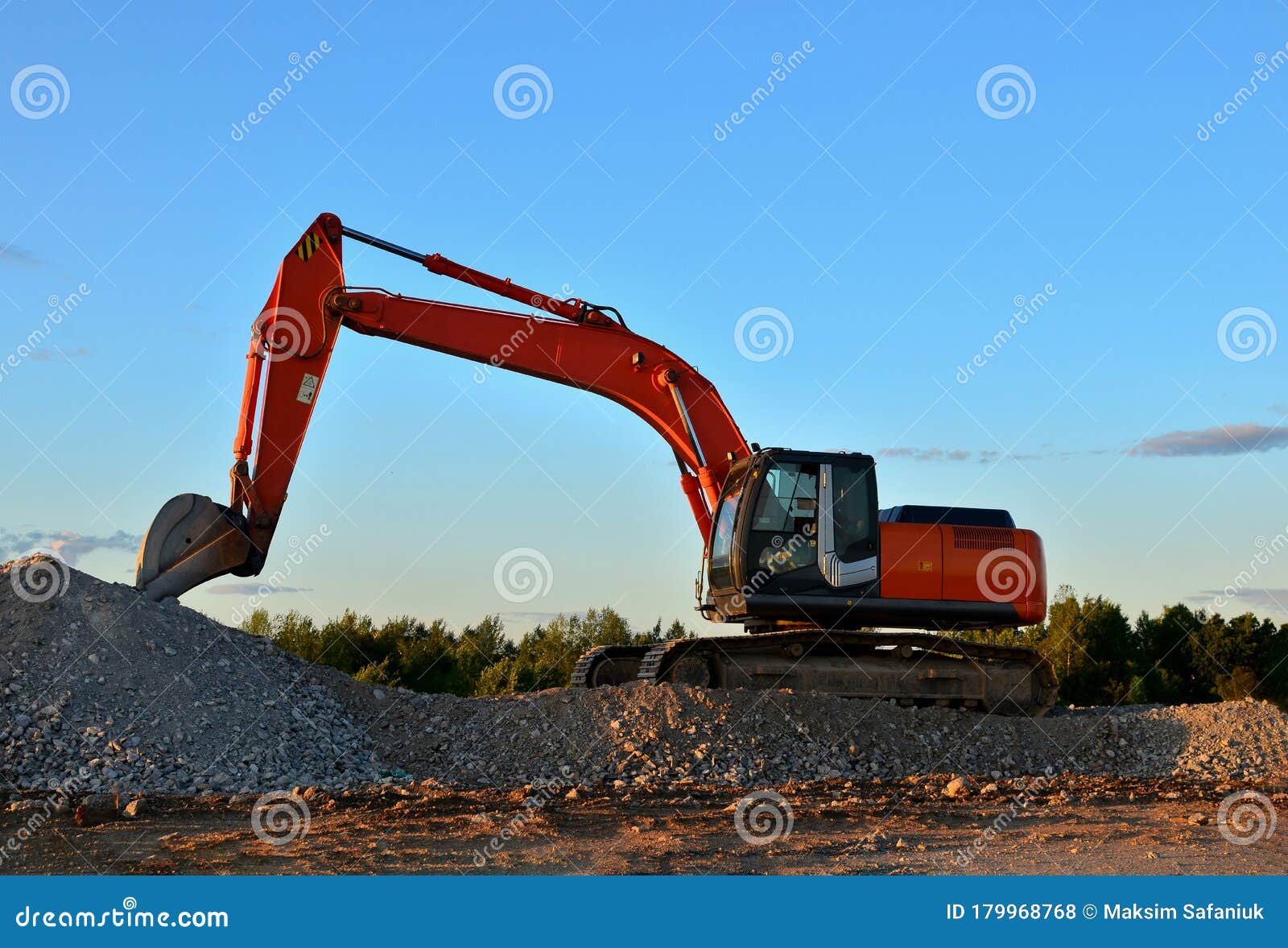 Excavator Loads of Stone and Rubble for Processing into Cement or ...