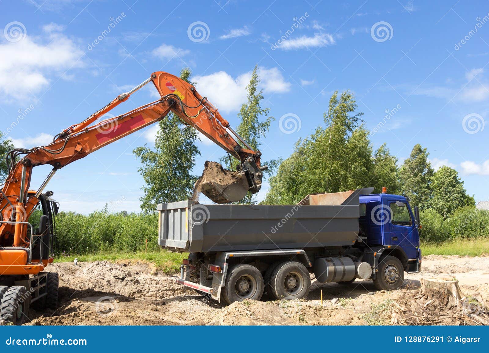 The Excavator Loads the Tipper Truck Stock Image - Image of scoop ...