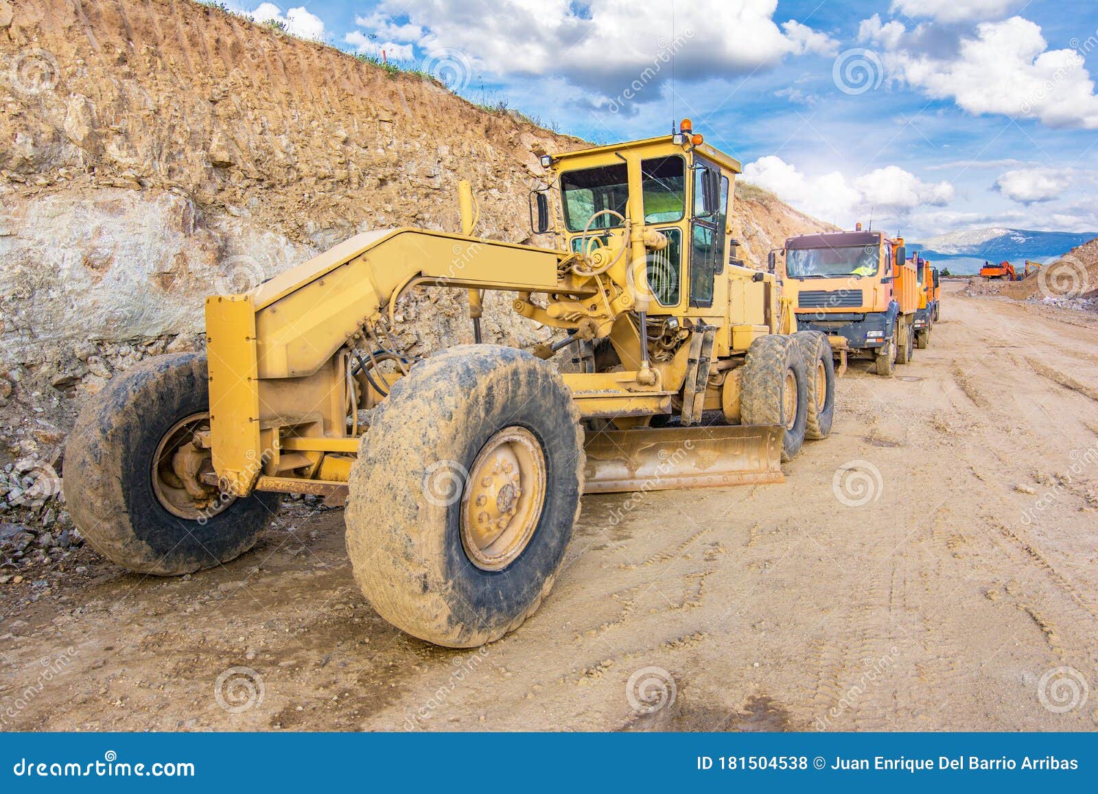 Excavator Machine Leveling the Ground with a Large Shovel Stock Photo ...