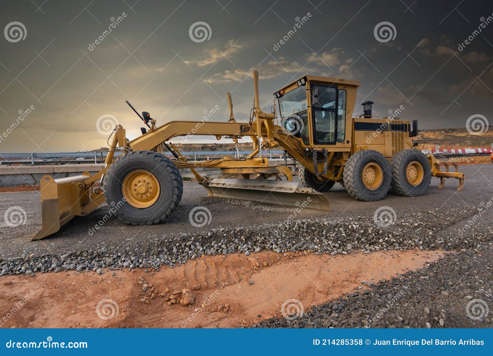 Excavator Machine Leveling the Ground at a Road Construction Site ...