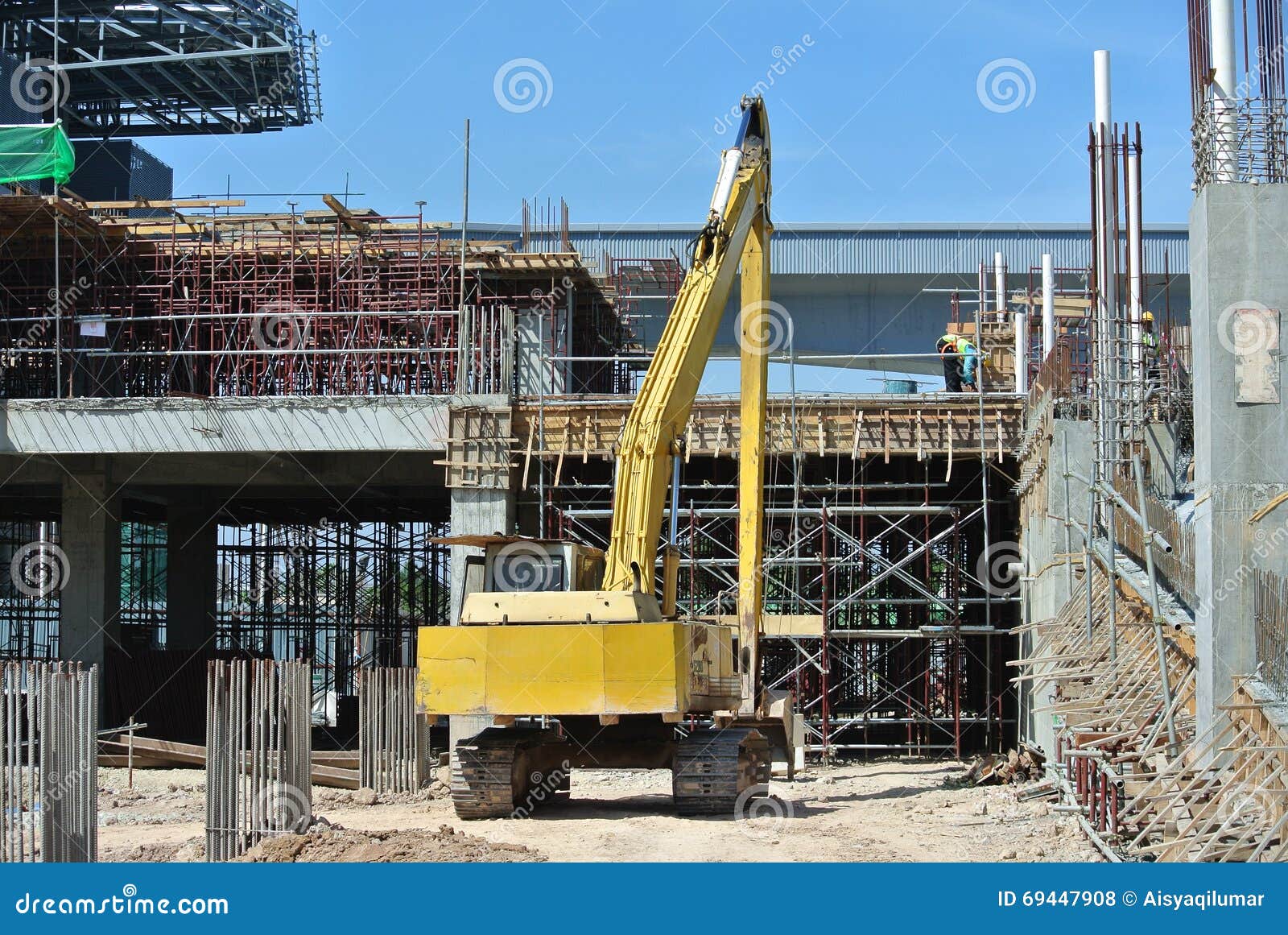 Excavator Machine Used To Excavate Soil at the Construction Site ... Excavator Machine Used To Excavate Soil at the Construction Site ...