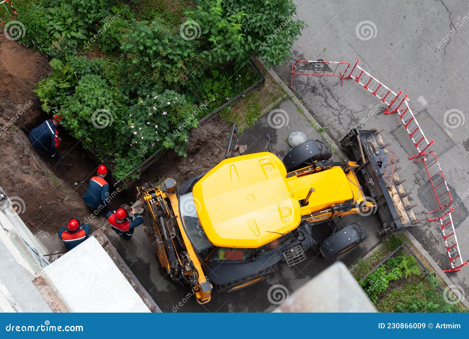 Excavator Machine and Workers Digging Dirt in the Backyard Stock Image ...
