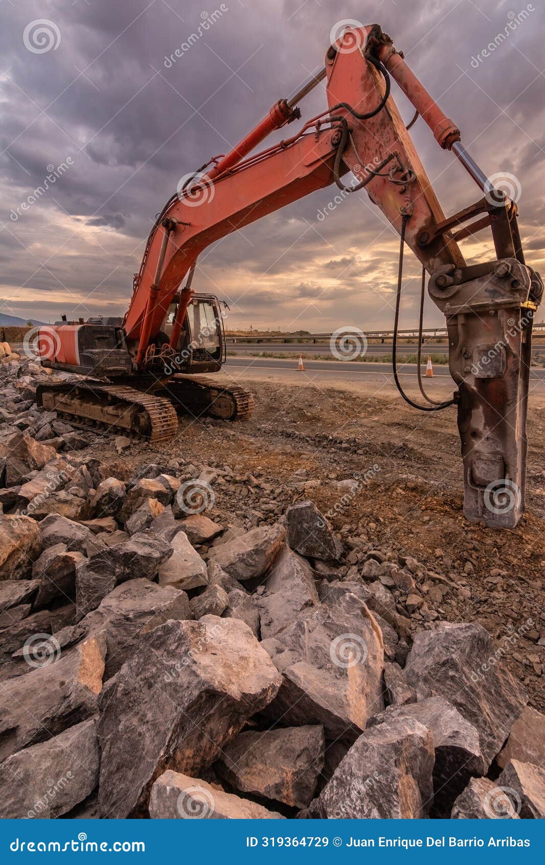 Excavator Making Earth Movements for the Construction of a Road Stock ...