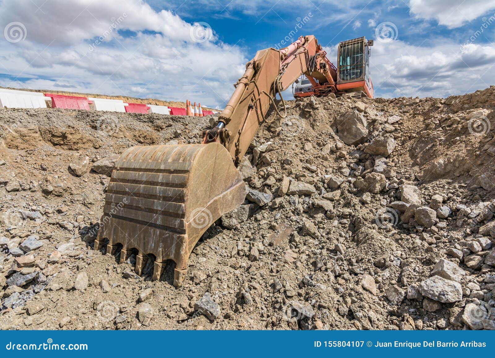 Excavator Making a Hole in a Construction Site Stock Image - Image of ...
