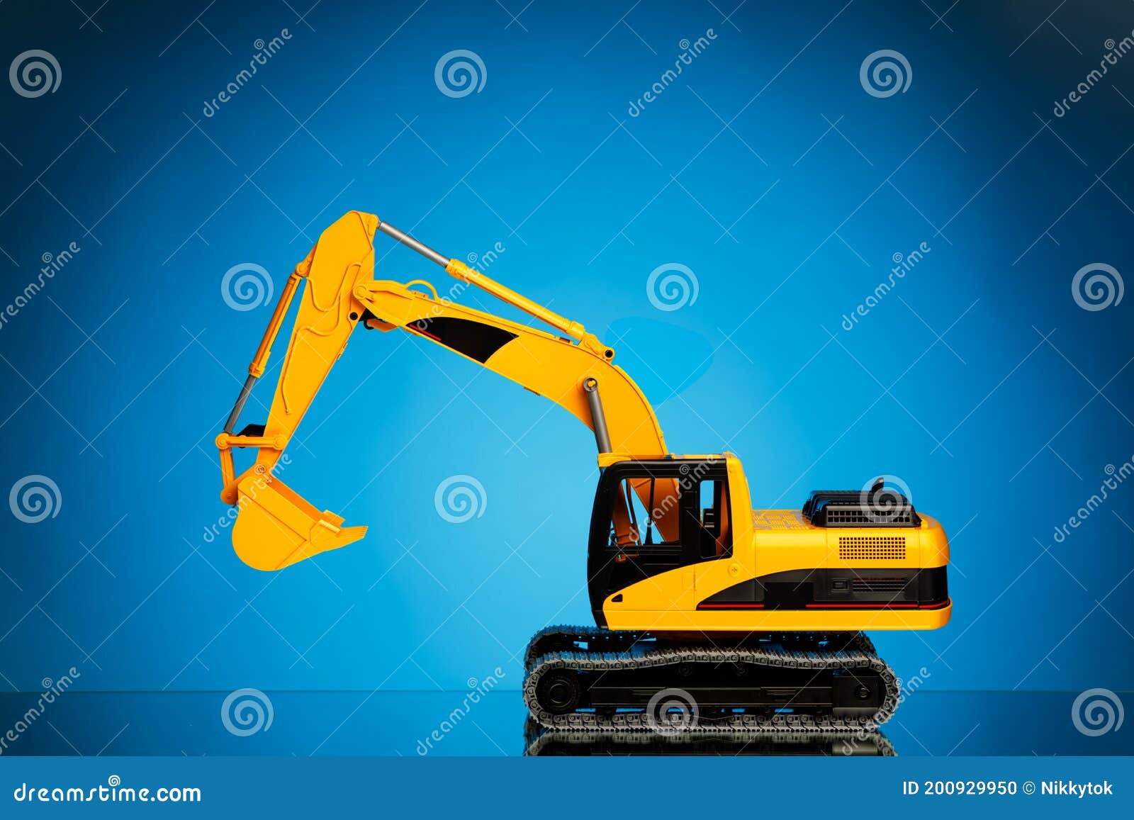 Excavator Model on Blue Background Stock Photo - Image of orange ...