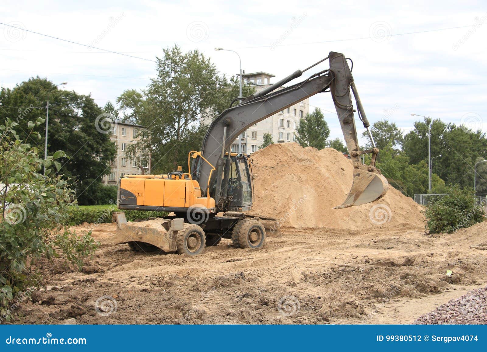 Excavator with a Raised Bucket Stock Photo - Image of excavation ...