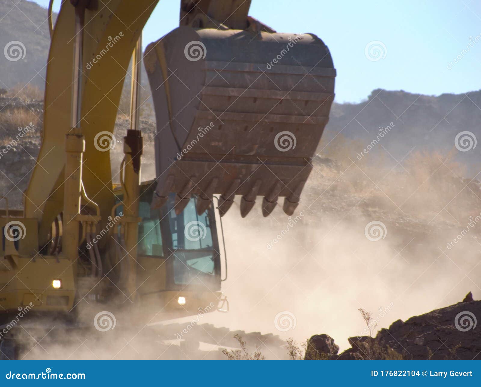 Excavator Working the Dirt in the Desert Stock Photo - Image of gold ...