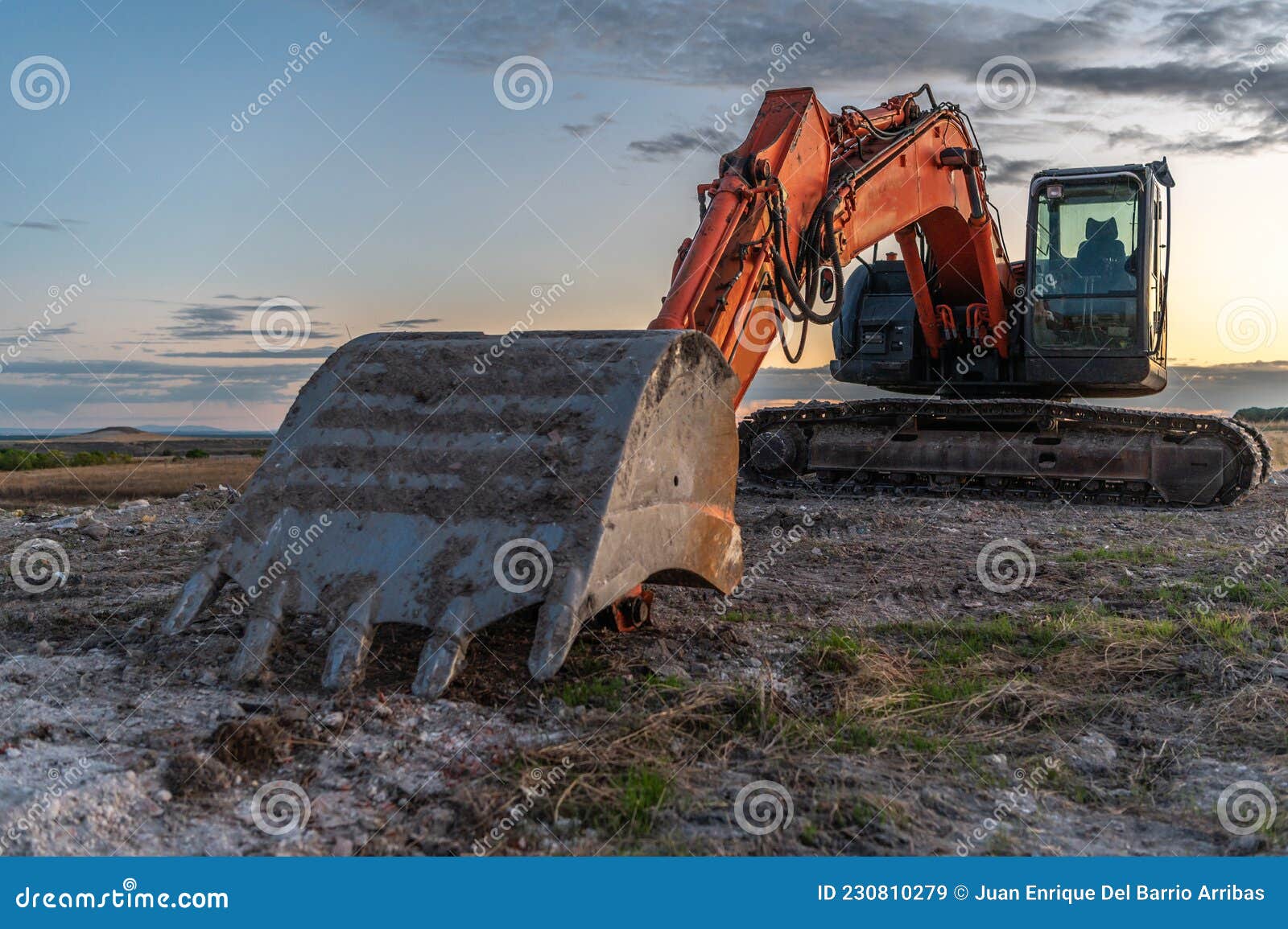 Excavator Moving Dirt and Sand at a Construction Site Stock Image ...