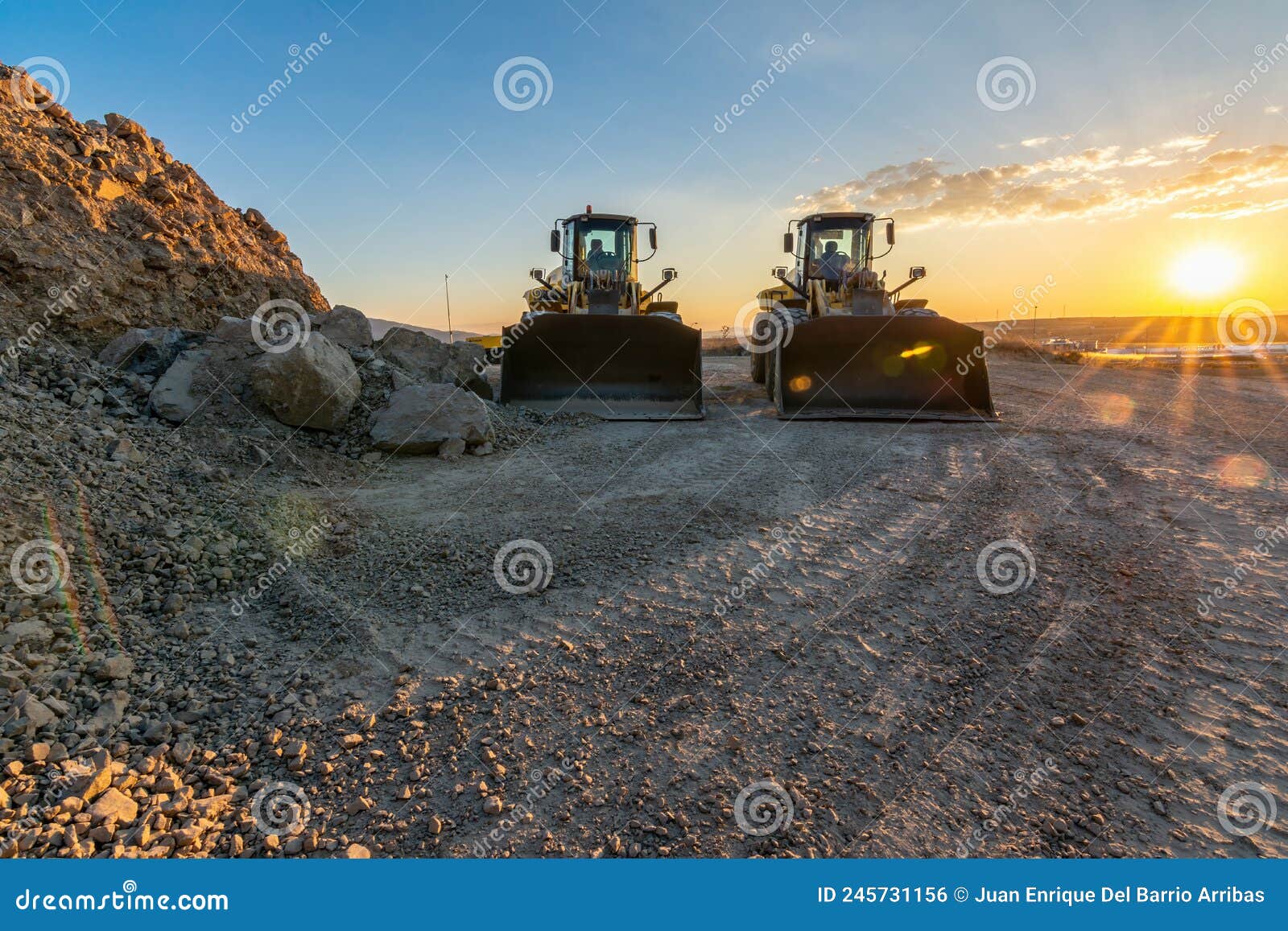Excavator Moving Dirt and Sand at a Construction Site Stock Photo ...