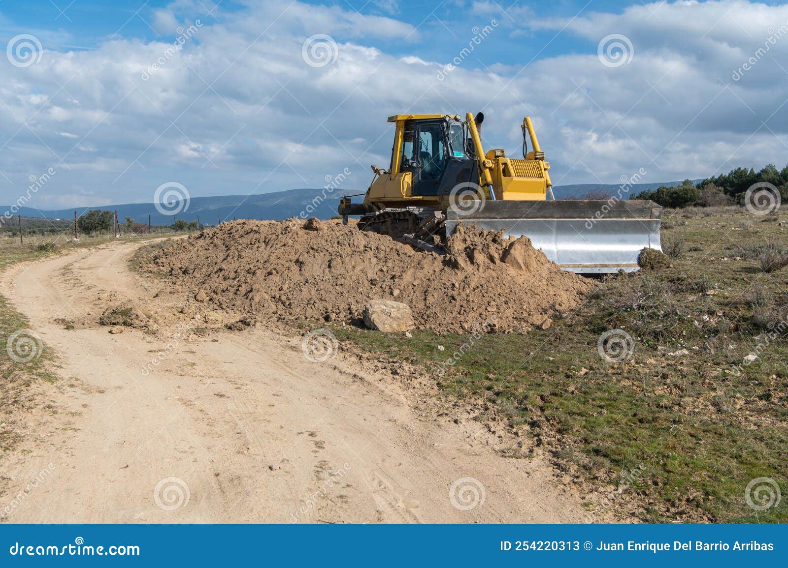 Excavator Moving Dirt and Sand at a Construction Site Stock Image ...