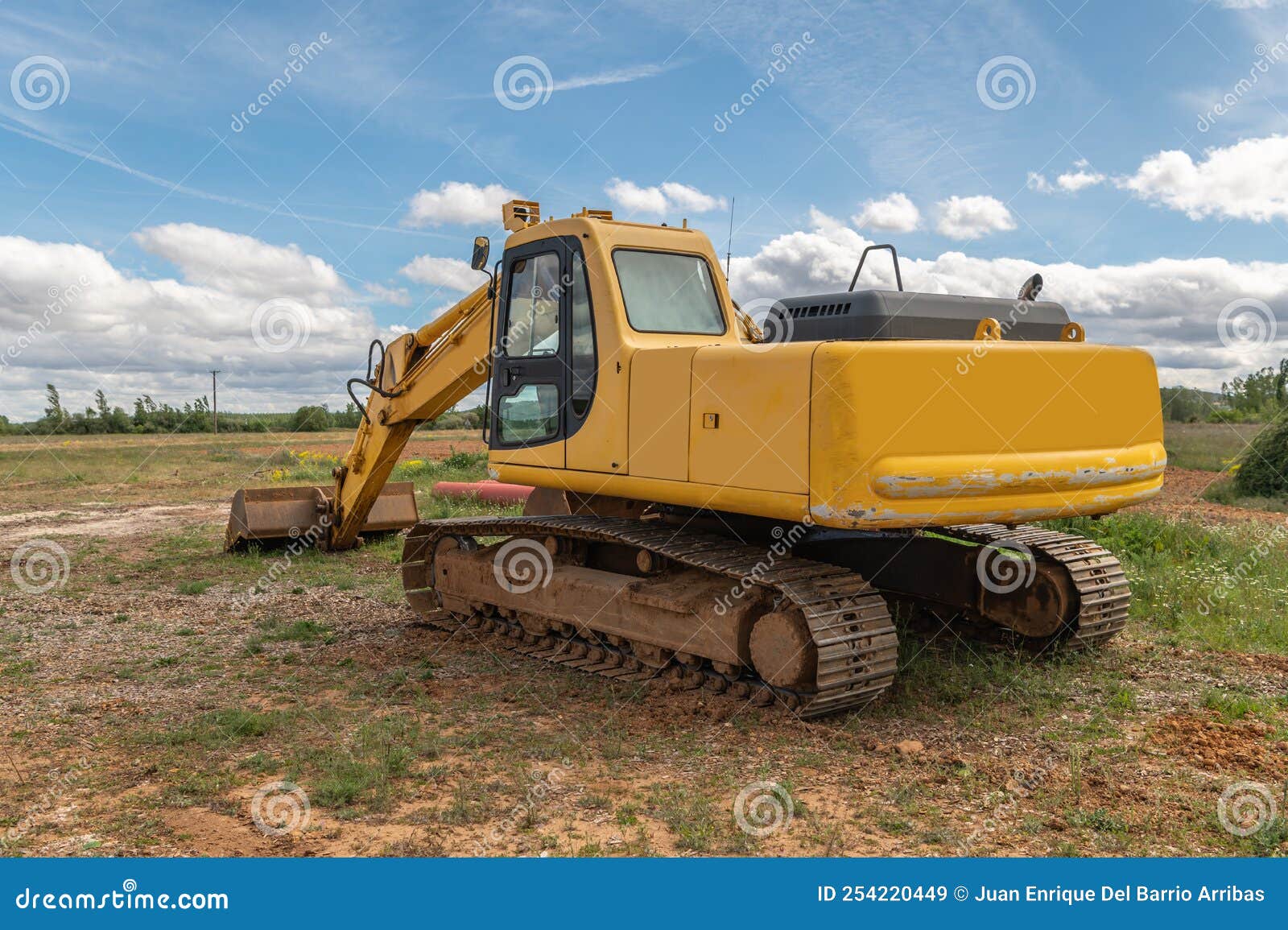 Excavator Moving Dirt and Sand at a Construction Site Stock Image ...