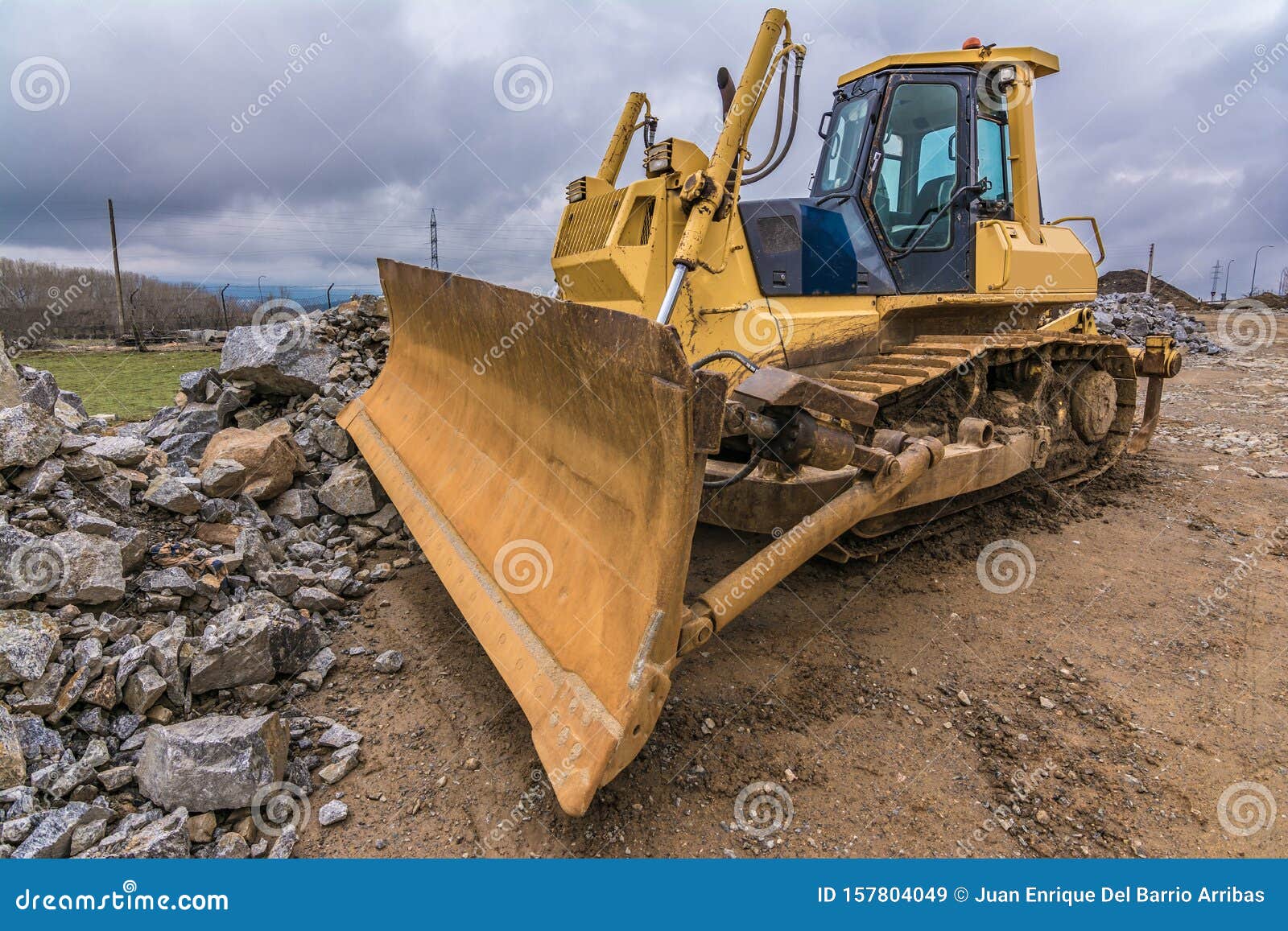 Excavator Moving Stone at a Construction Site Stock Image - Image of ...