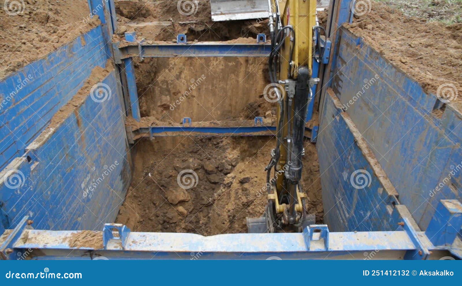 The Excavator Operator Selects the Soil from the Trench, the Walls of ...