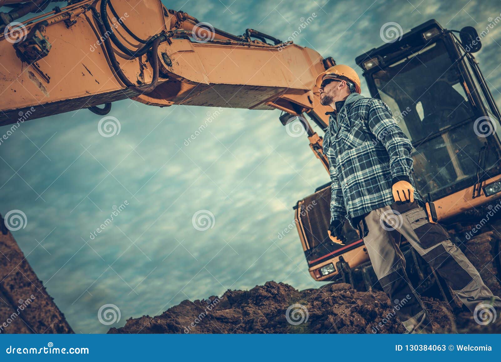 Excavator Operator at Work stock image. Image of contractor - 130384063