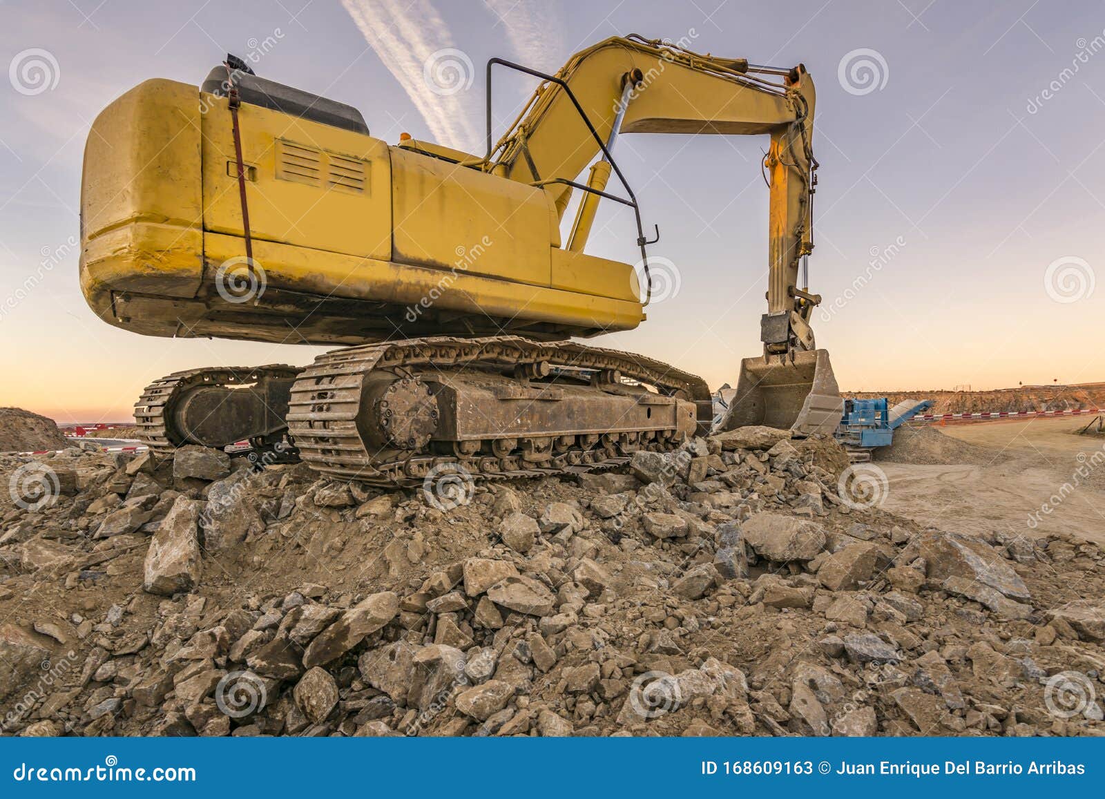 Excavator Performing Stone Extraction Work in an Open Pit Stone Mine ...