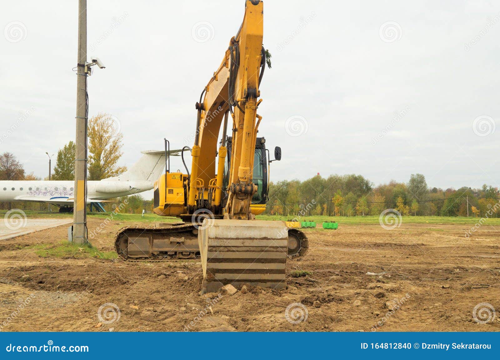 Excavator Performs Excavation Work in the Swamp Stock Photo - Image of ...