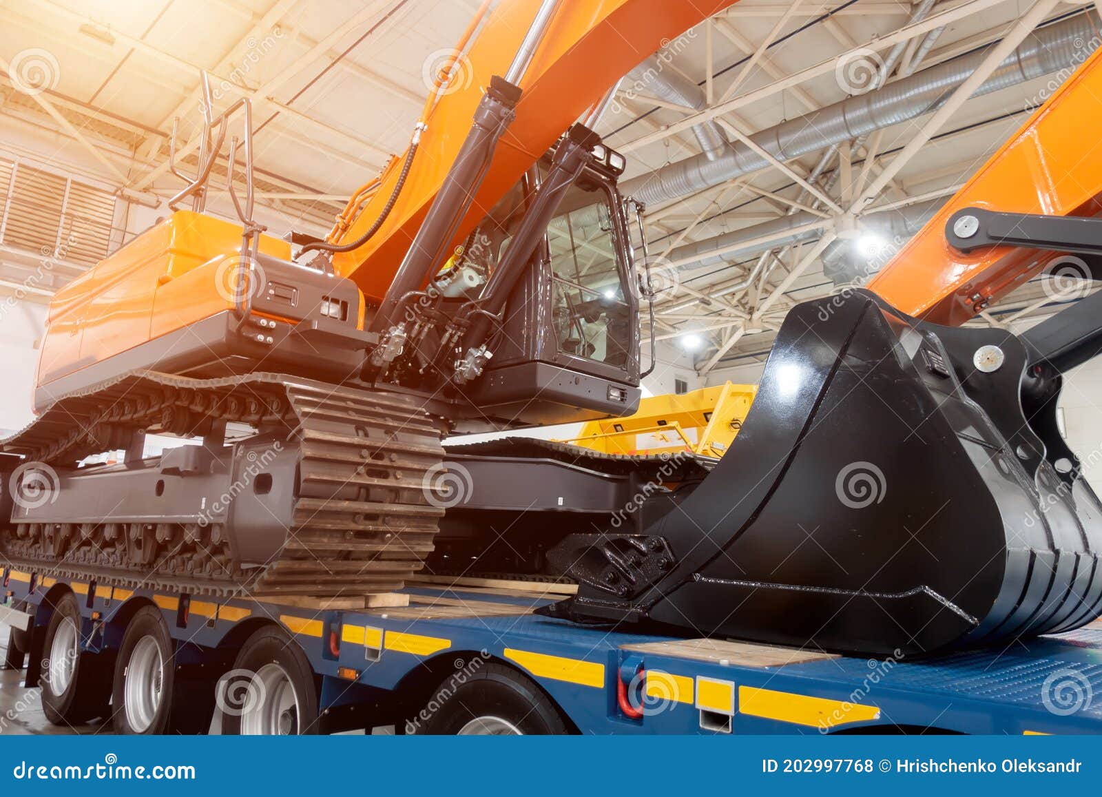 Excavator on a Platform for Transporting Cars Stock Photo - Image of ...