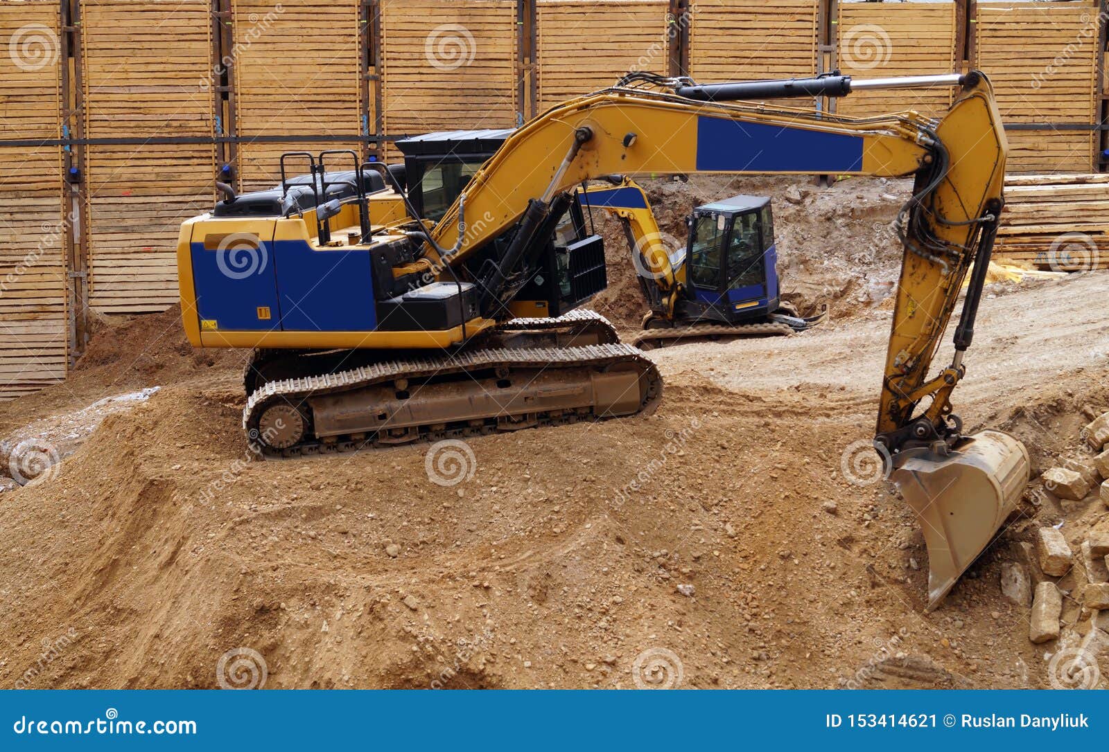 An Excavator Prepares a Pit for Construction Stock Image - Image of ...