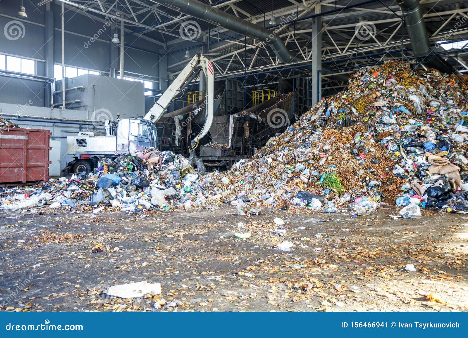 Excavator on Primary Sorting of Garbage at Waste Processing Plant ...